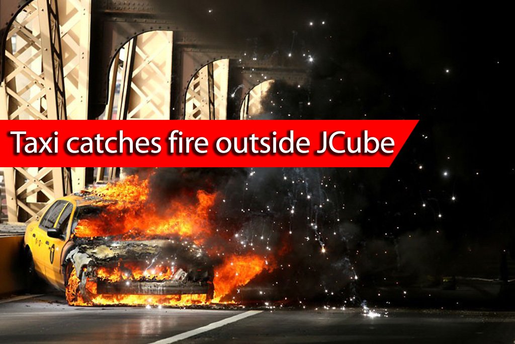 Taxi catches fire 200 metres from JCube shopping mall