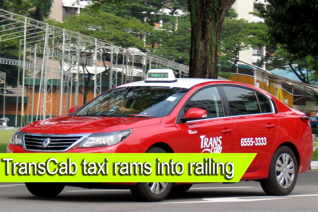 TransCab taxi rams into road railing and lands on side - Sgcarmart