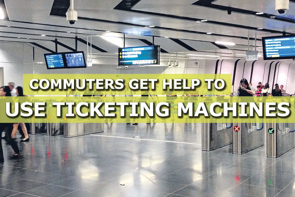 Commuters get help to use ticketing machines