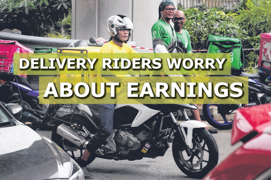 Delivery riders in Singapore taking precautions, worry about earnings