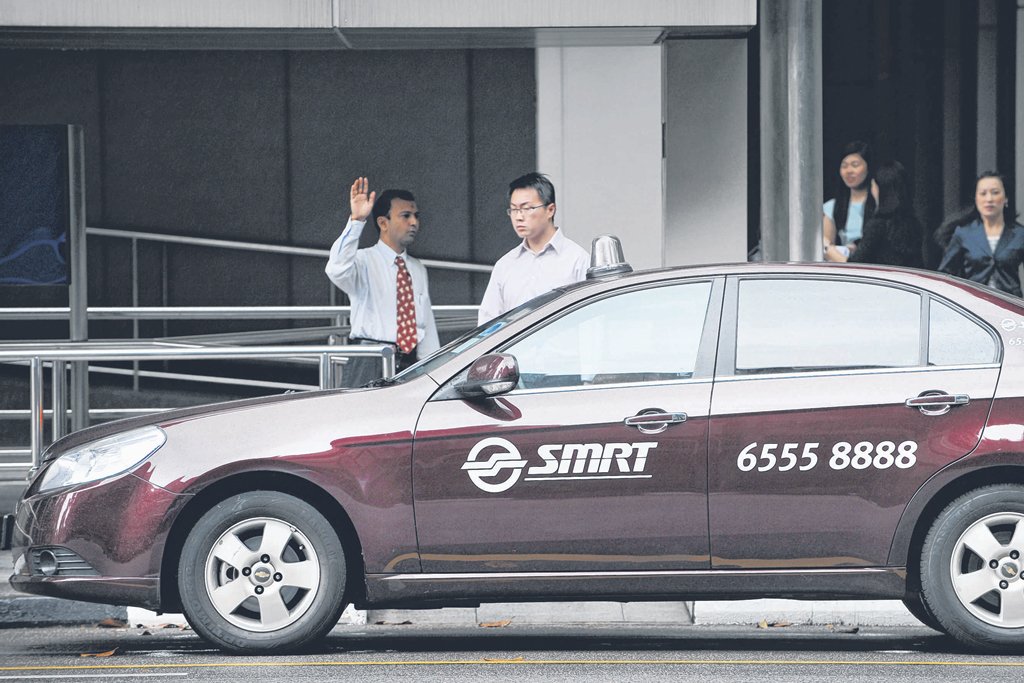 Grab one of SMRT's upcoming electric taxis and you could save on your fare